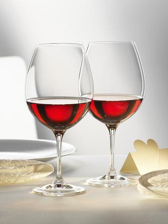 'Two Glasses of Red Wine on Festive Table' Photographic Print ...
