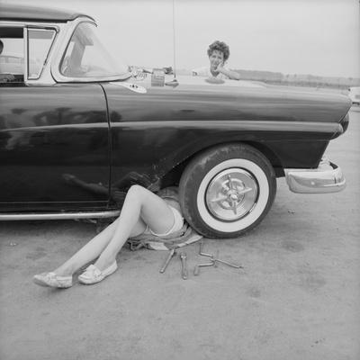 All-Girl "Dragettes" Hotrod Club Working on Car Engine with Children ...