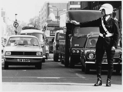 Traffic Police Officer Directing Traffic in London Metropolitan Police ...