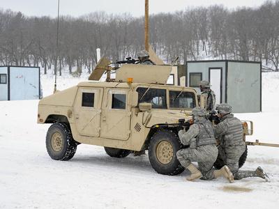 'U.S. Soldiers Take Cover Behind a Humvee During Combat Support ...