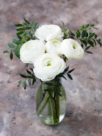 'White Ranunculus Flowers in Vase Grey Background' Photographic Print ...
