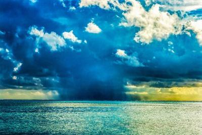 'Rain storm cloud, Moorea, Tahiti, French Polynesia. Blue colors in ...