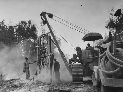 'Workers From Gulf Interstate Gas Co. Laying Pipe to Be Used in Natural ...