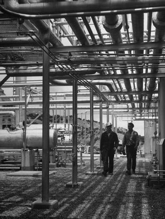 'Workers Walking Through the Oil Shale Retorting Refinery' Photographic ...
